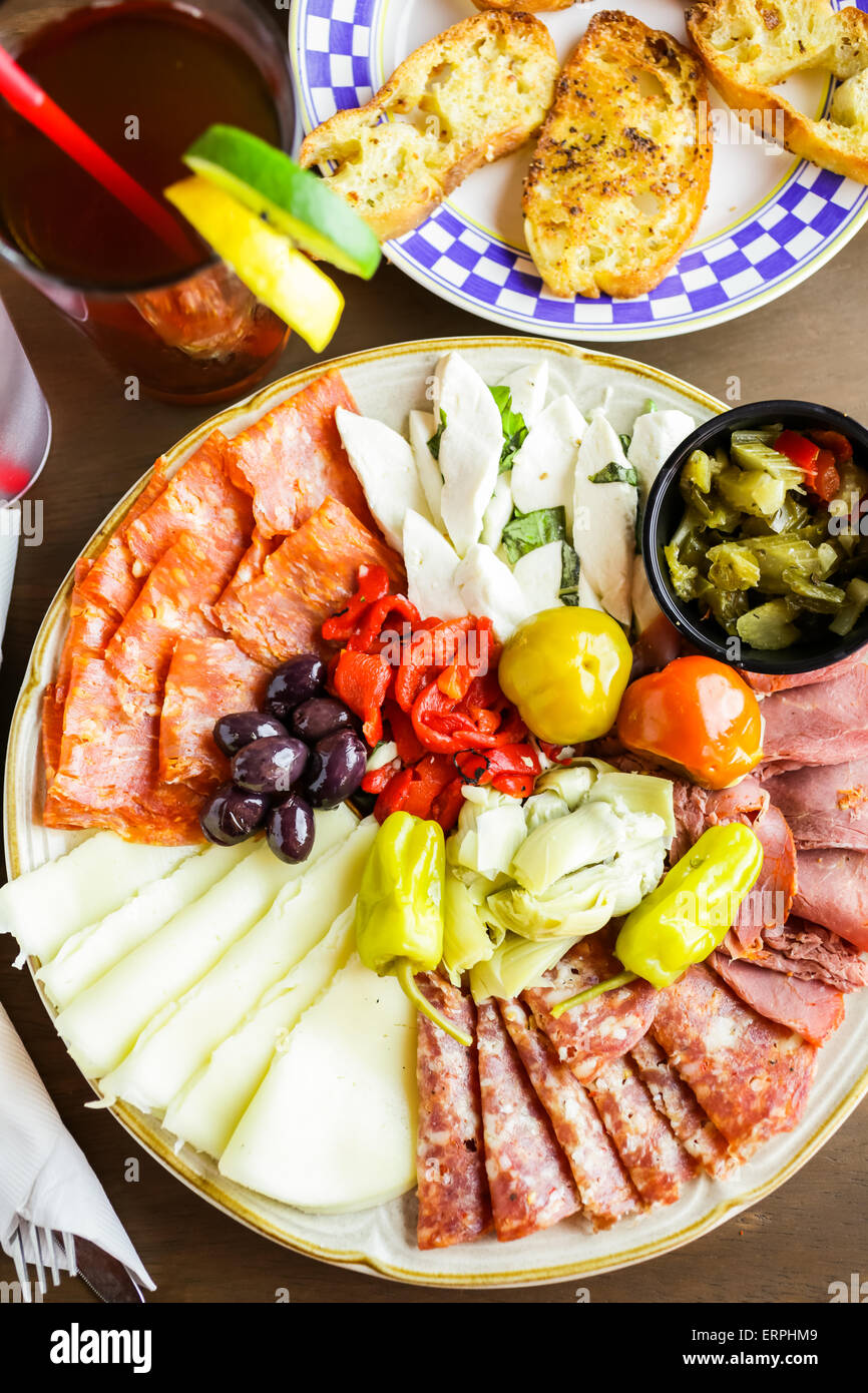 Appetizers plate with antipasto in Italian restaurant Stock Photo - Alamy