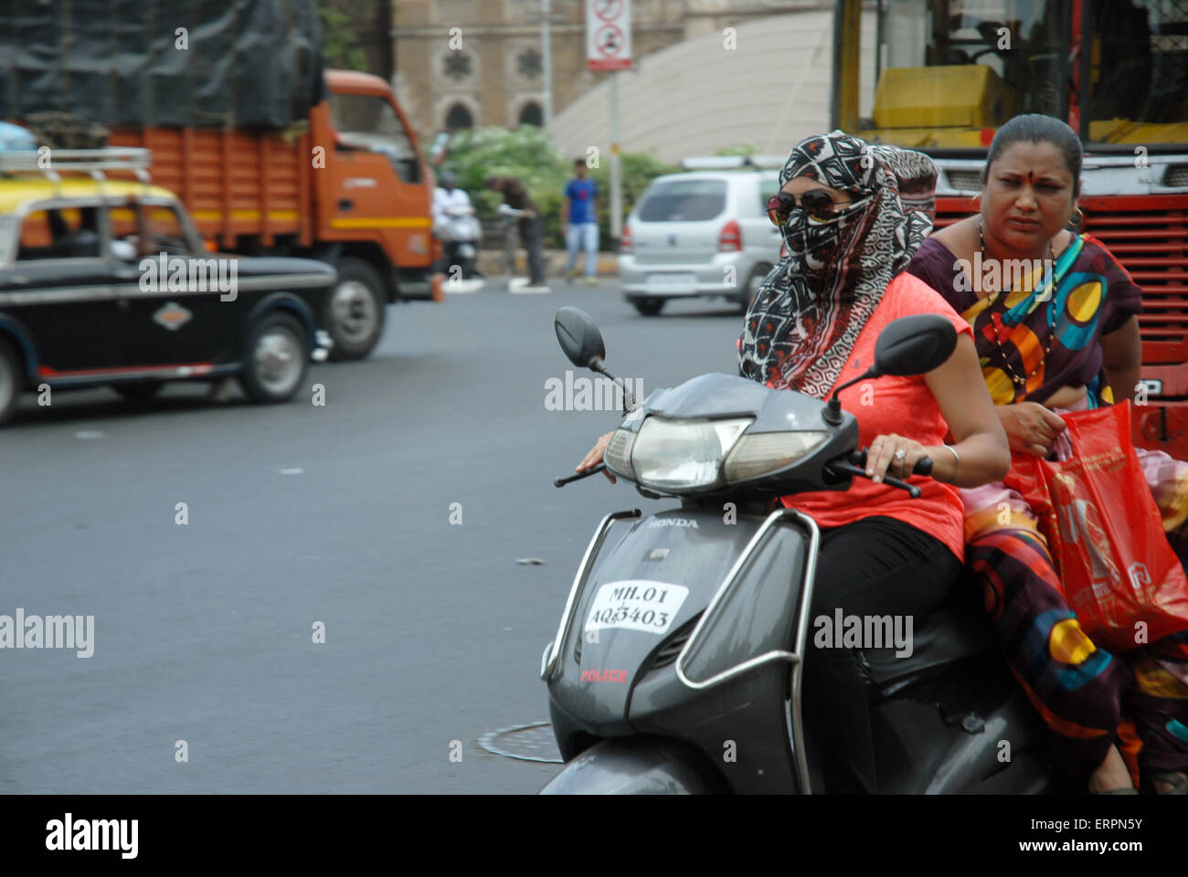 Scooter riding indian women hi-res stock photography and images - Alamy