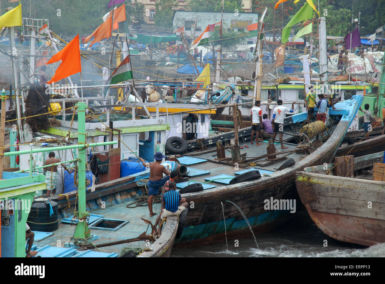 Fishing boats anchored at Sassoon Docks fish market, Mumbai ...