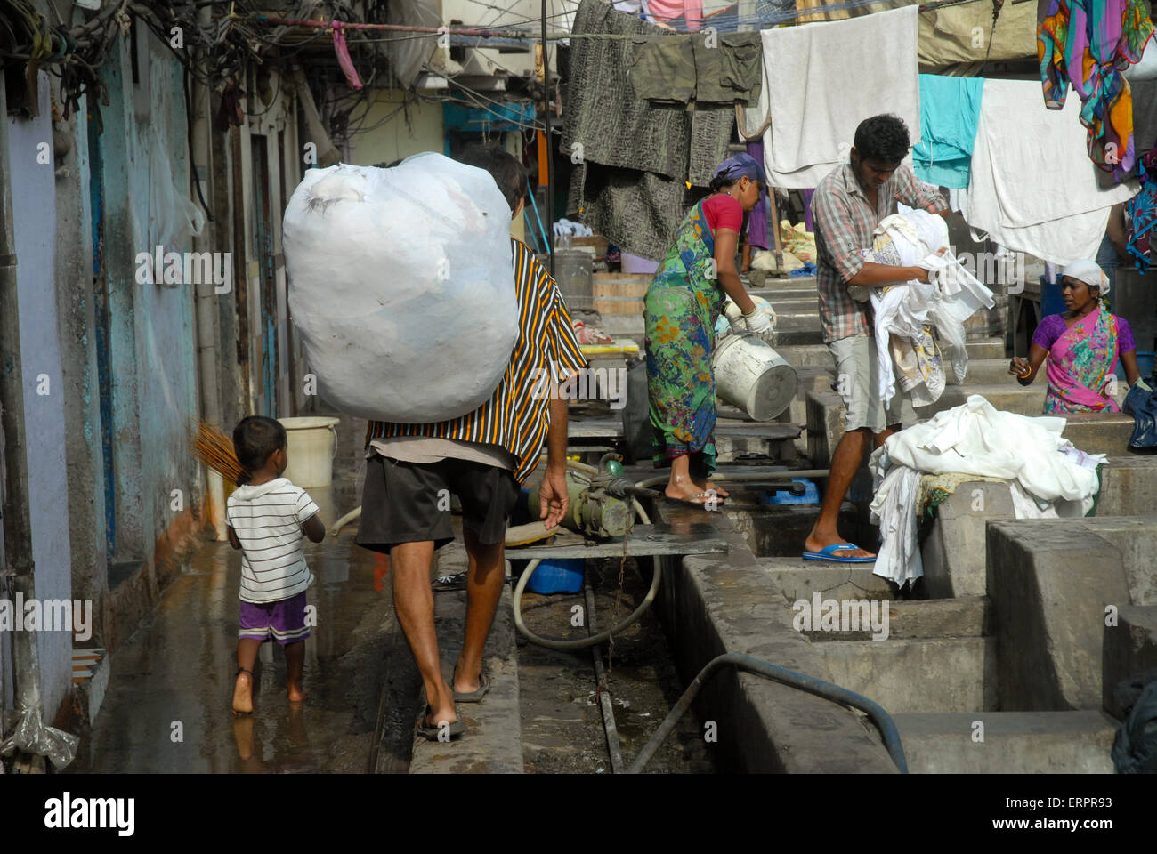 Men washing clothes at Mahalaxmi Dhobi Ghat open air laundromat, Mumbai ...