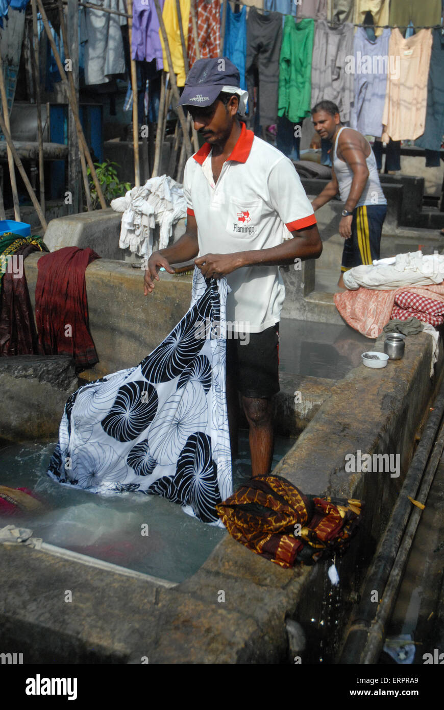 Men washing clothes at Mahalaxmi Dhobi Ghat open air laundromat, Mumbai ...