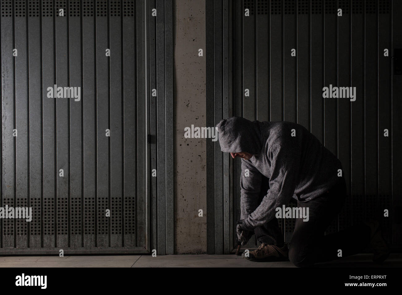 Breaking into building hi-res stock photography and images - Alamy