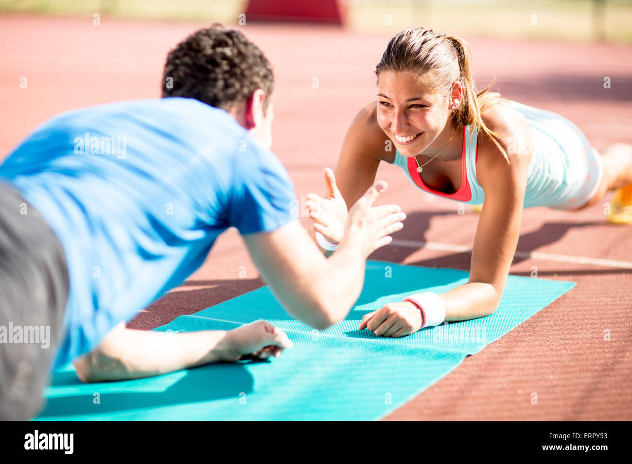 Woman training with personal trainer Stock Photo - Alamy