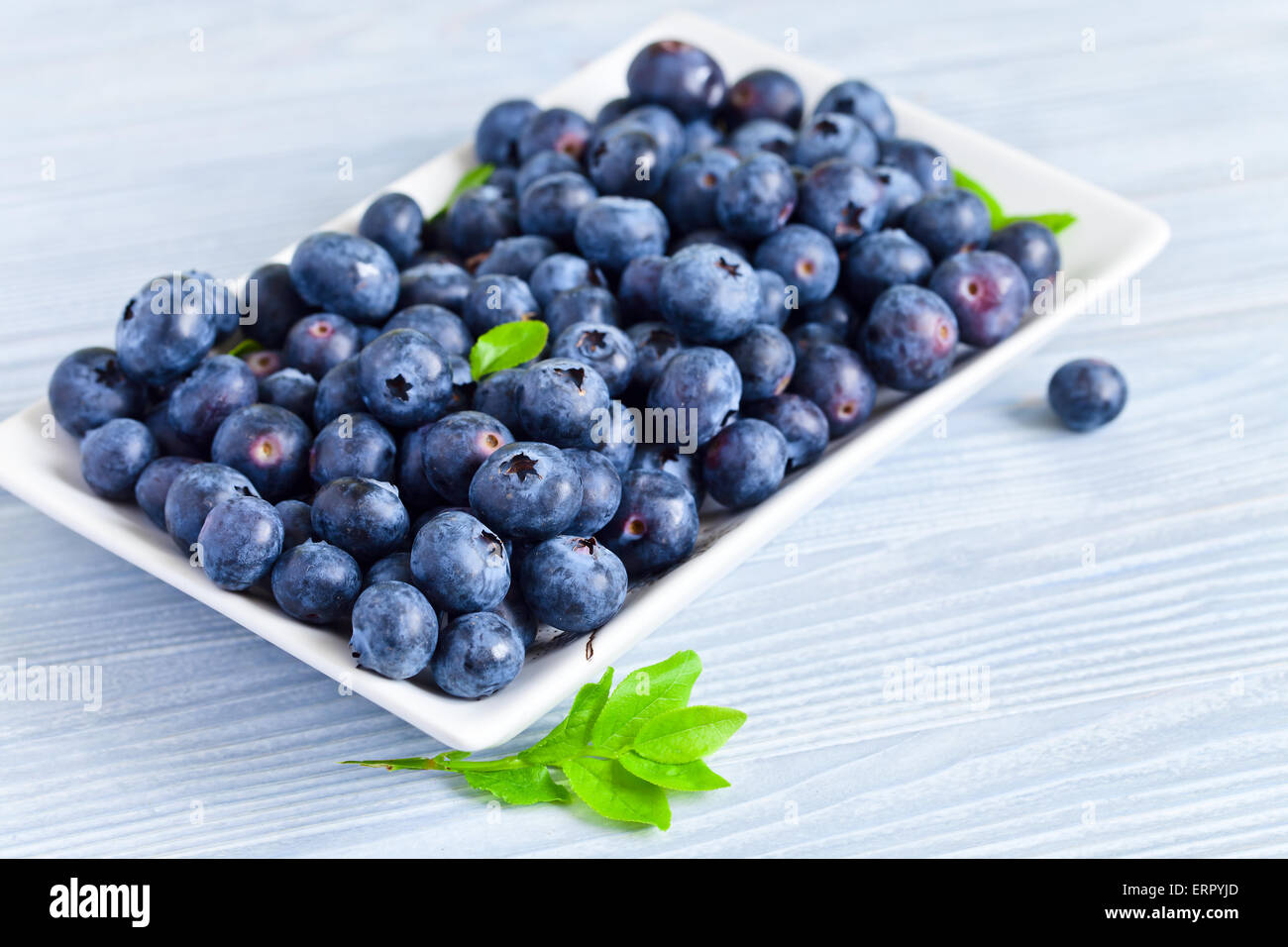 Blueberries, ripe berries on a old woden table Stock Photo - Alamy