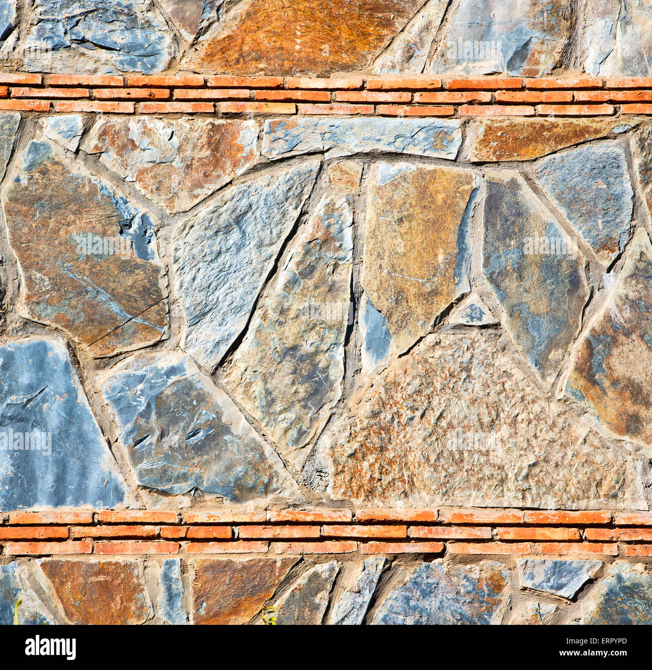 rocks stone and red orange gneiss in the wall of morocco Stock Photo ...