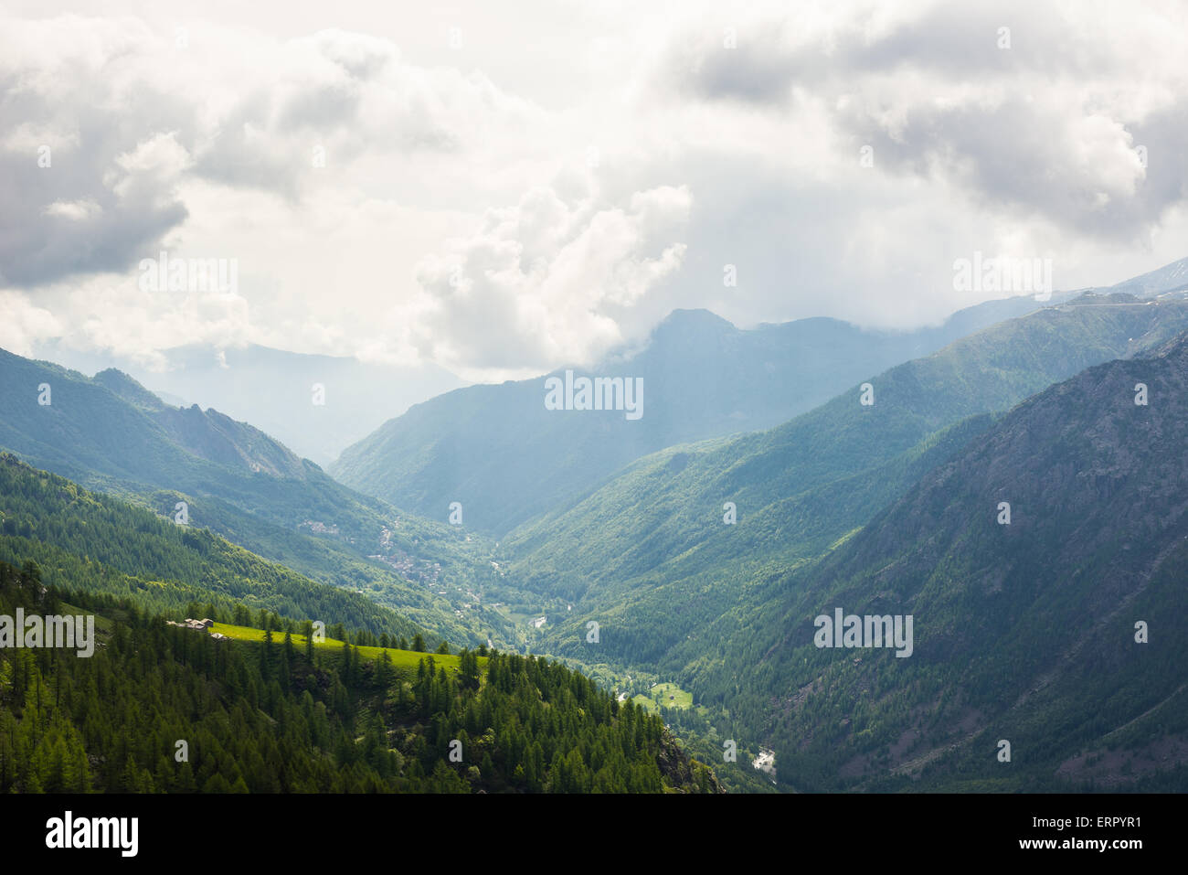 Dramatic sky in amazing green alpine valley in spring season. Location ...