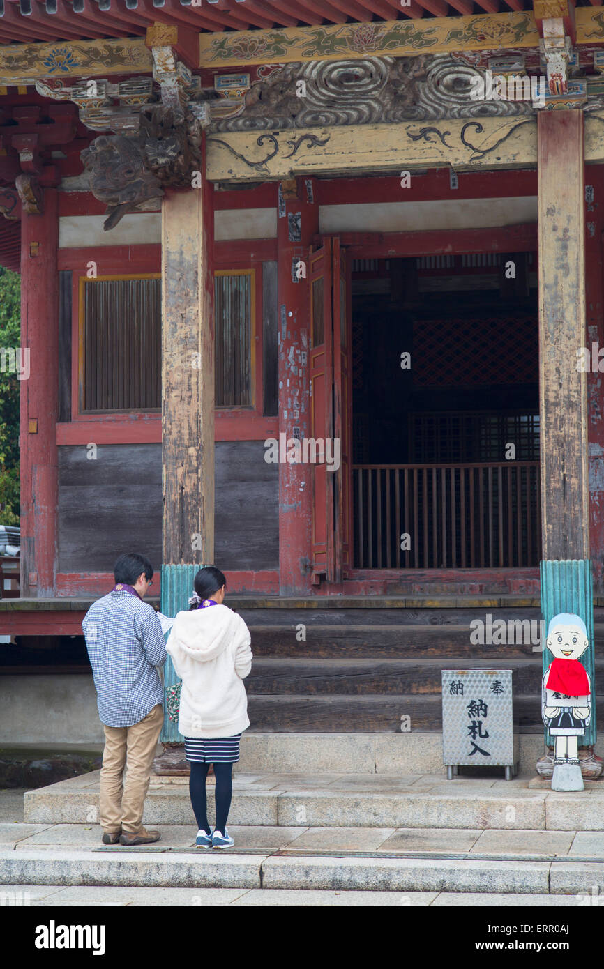 Couple praying at Yashima-ji, Takamatsu, Shikoku, Japan Stock Photo - Alamy