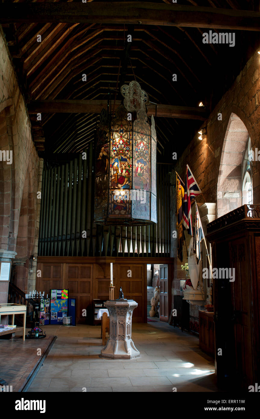 Stained glass lantern over the font of St. Peter`s Church, Kinver ...
