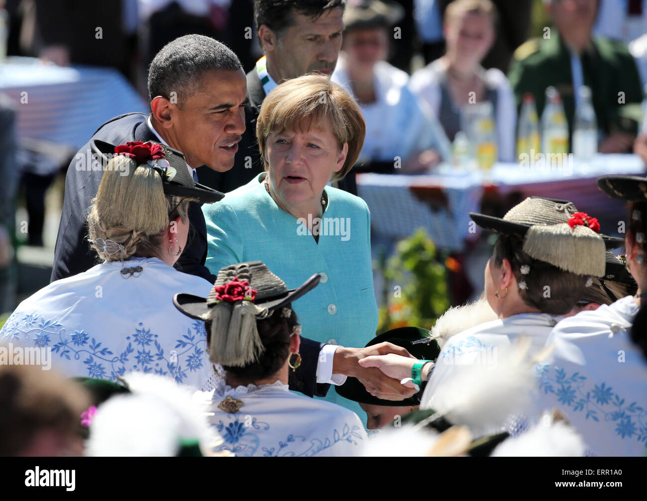US President Barack Obama (L) talks to members of the public in ...