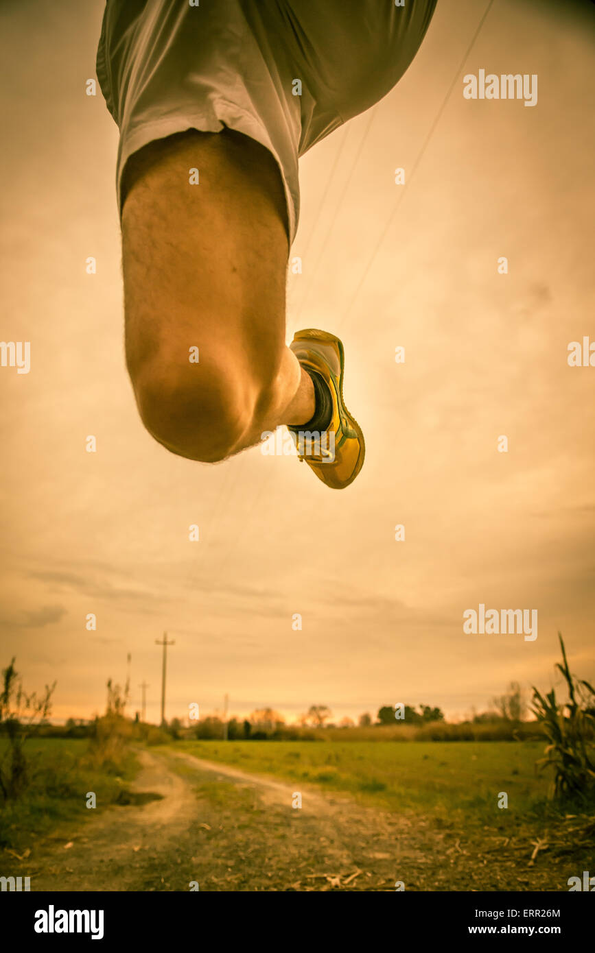 A guy that jump while he's running Stock Photo - Alamy