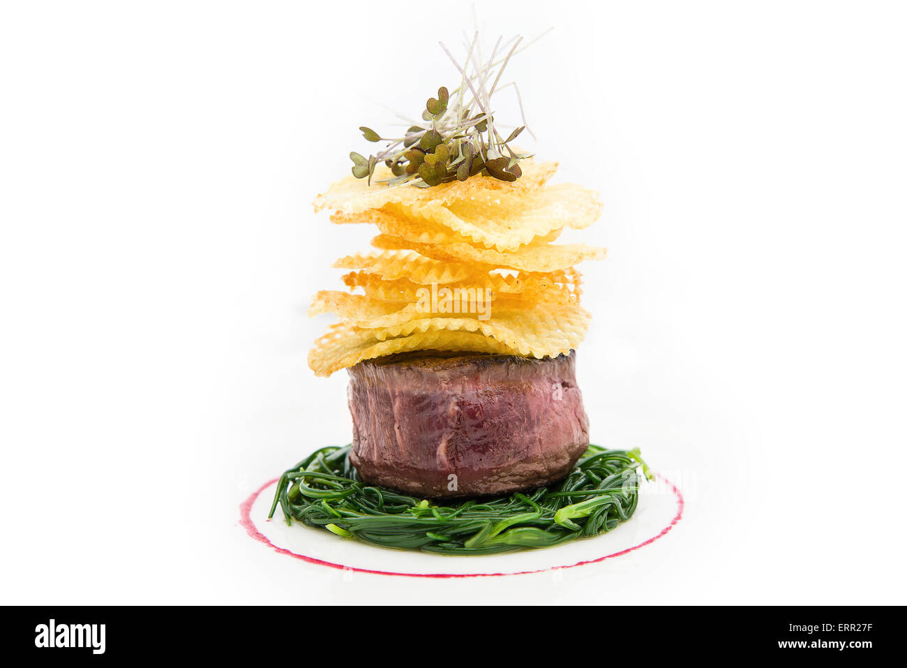 A gourmet hand-made chips and beff on a vegetable plate Stock Photo - Alamy