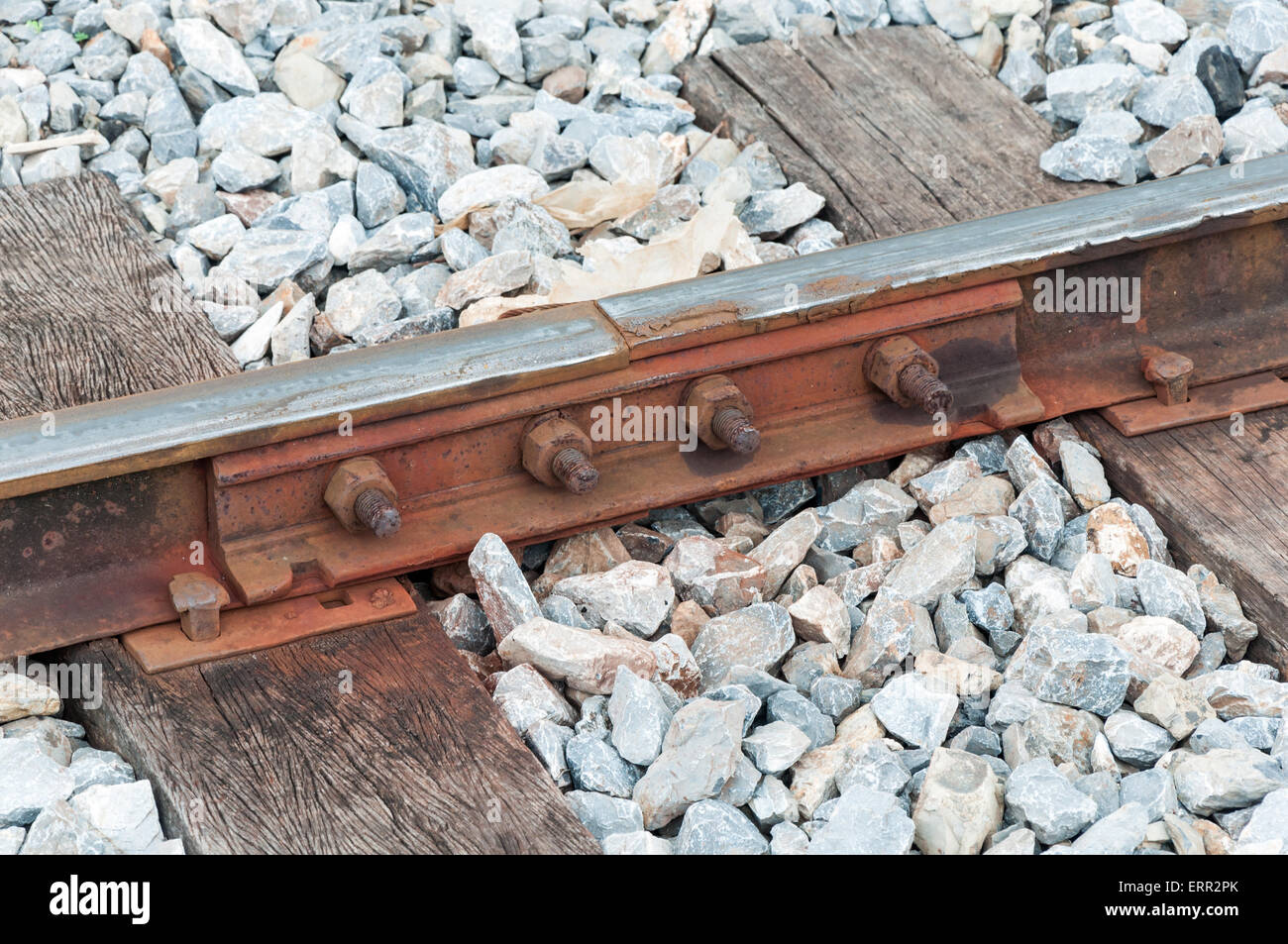 Rusty railway between the joint line in station Stock Photo - Alamy