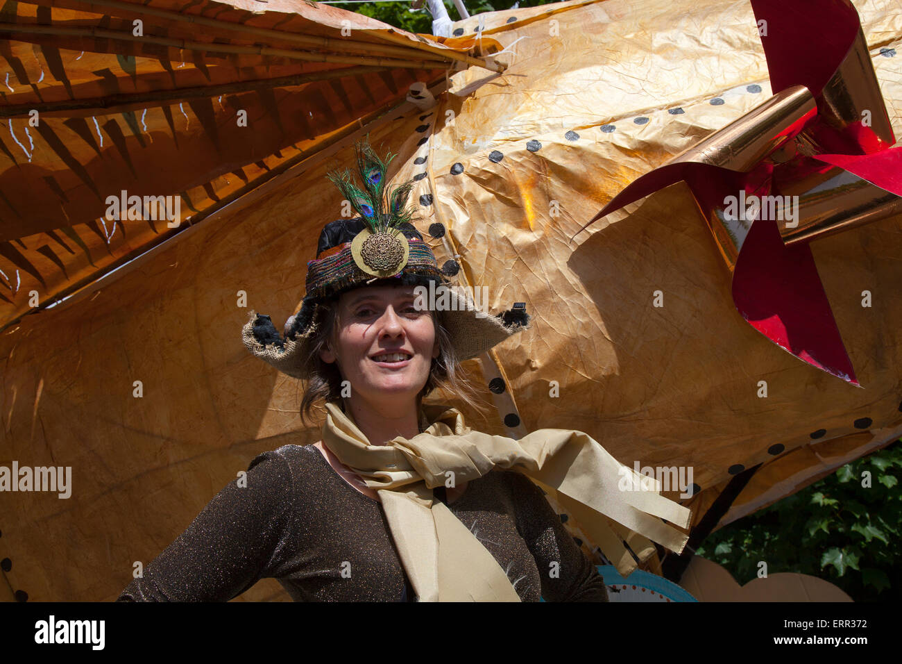 Actor, actress dressed in Biggles costume, with scarf and flying helmet ...