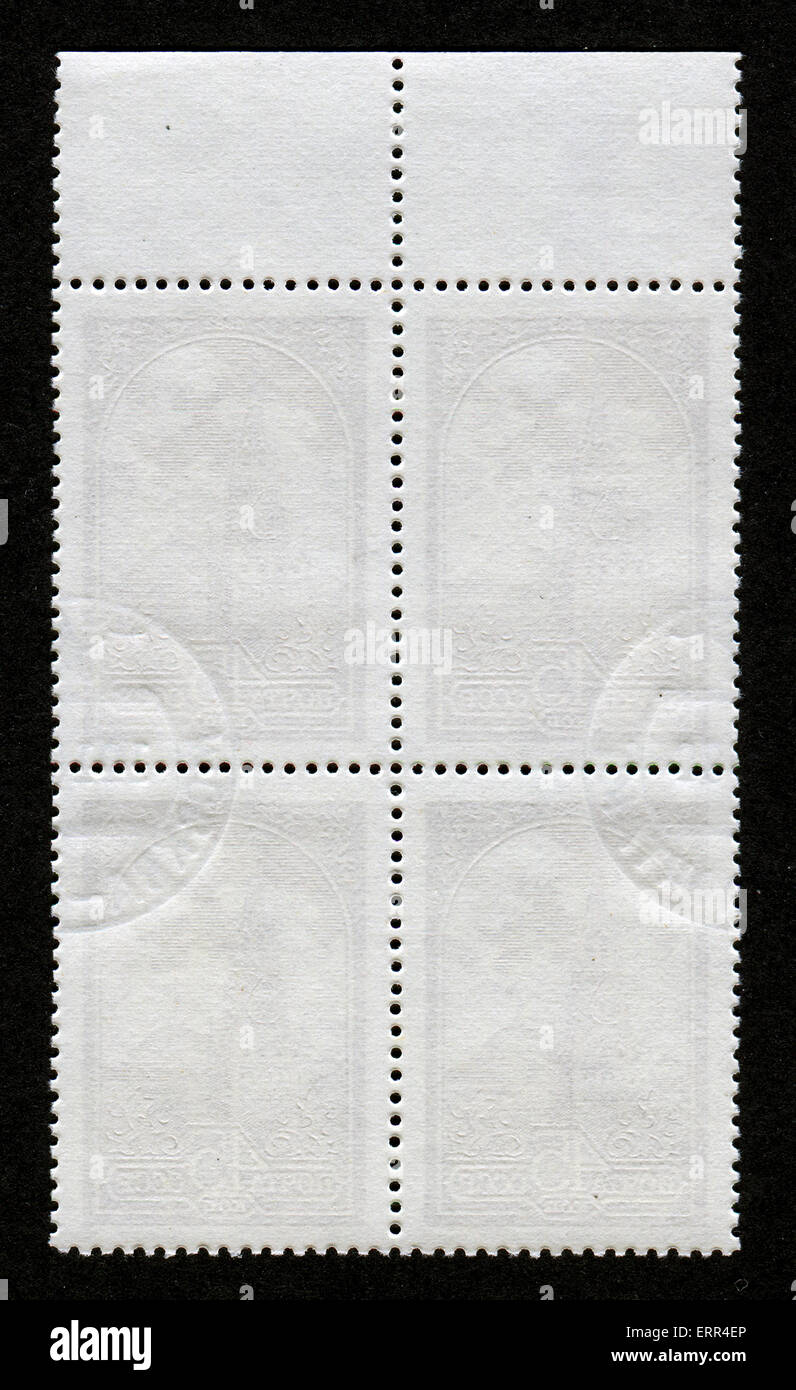 The reverse side of a postage stamp Stock Photo - Alamy