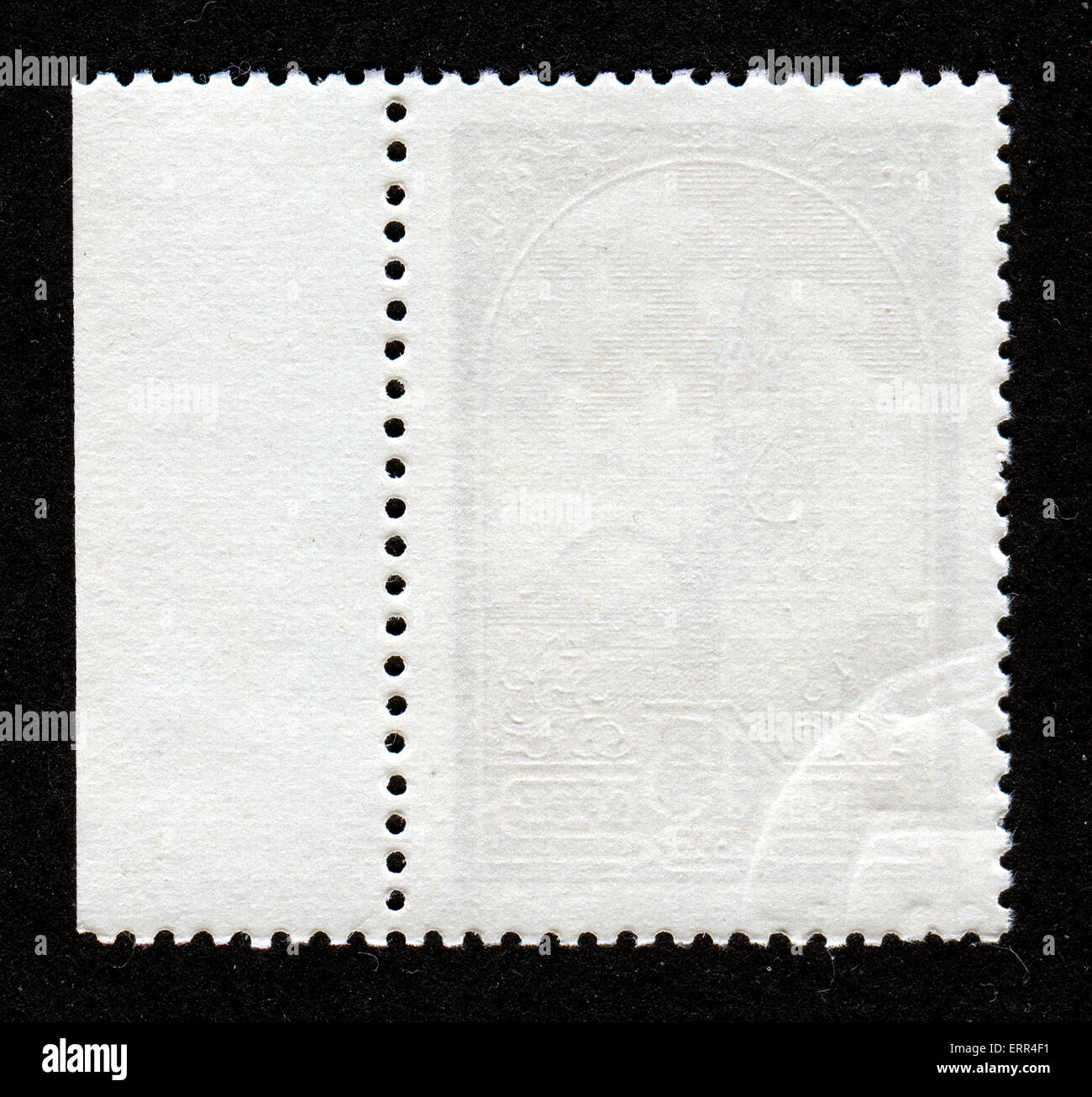 The reverse side of a postage stamp Stock Photo - Alamy