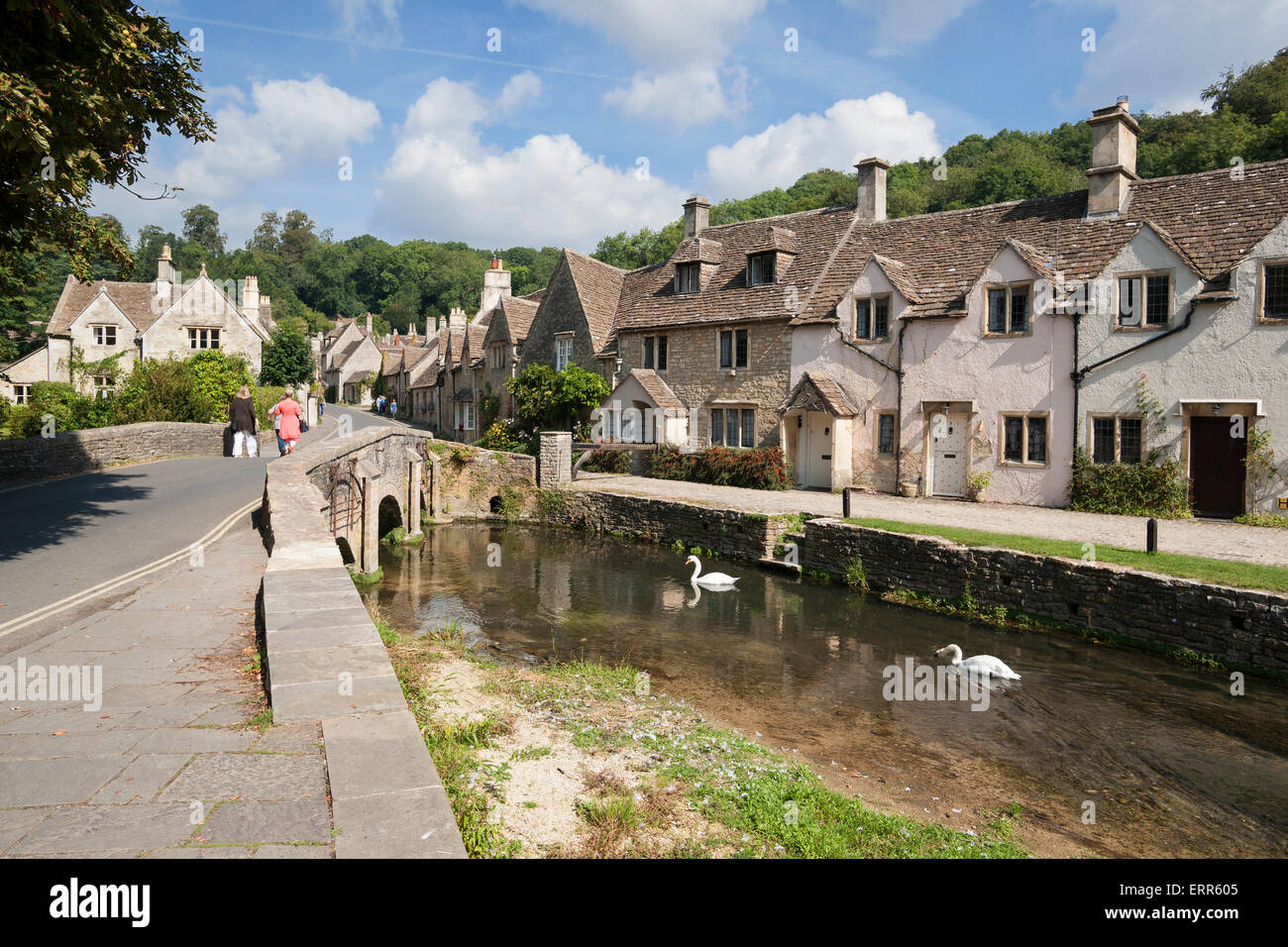 Castle Combe, High Street and Bybrook River, Wiltshire, England UK ...