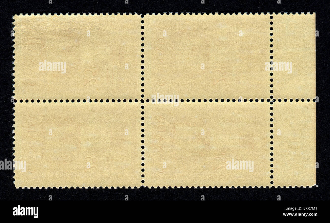 The reverse side of a postage stamp Stock Photo - Alamy