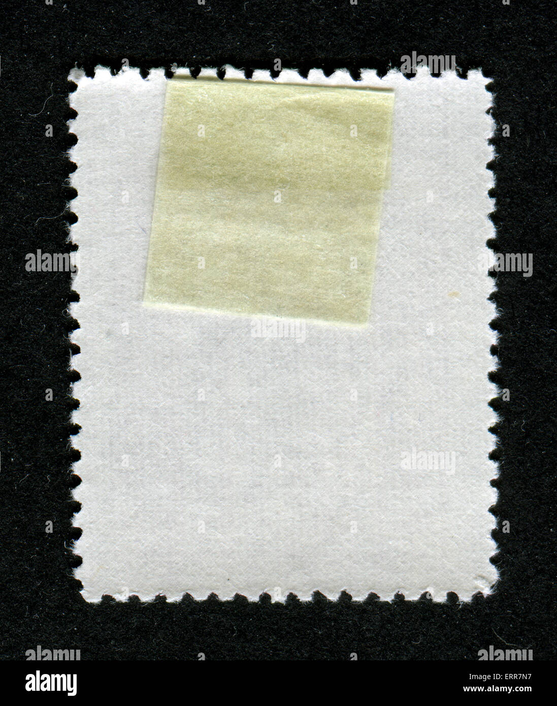 The reverse side of a postage stamp Stock Photo - Alamy