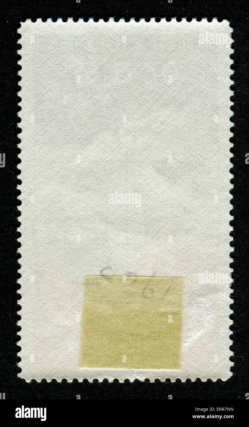 The reverse side of a postage stamp Stock Photo - Alamy