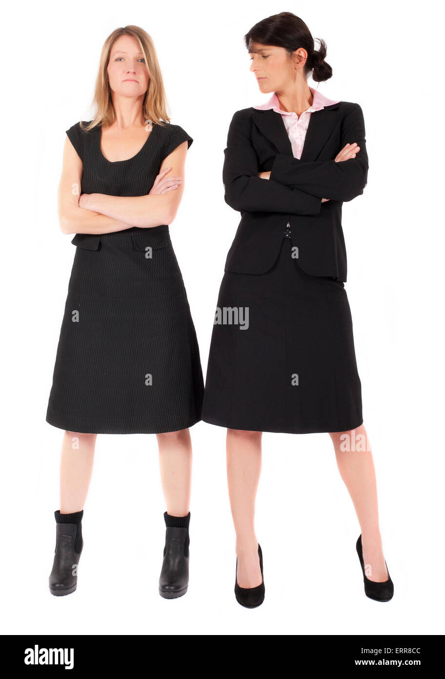 Two women standing next to each other hi-res stock photography and ...