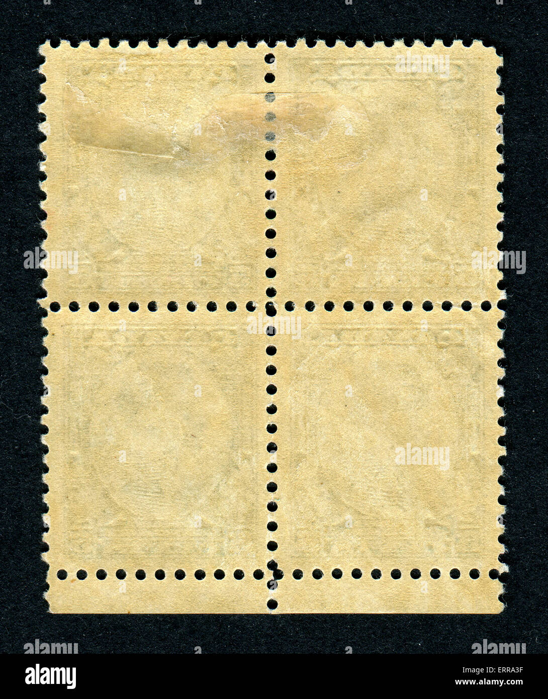 The reverse side of a postage stamp Stock Photo - Alamy