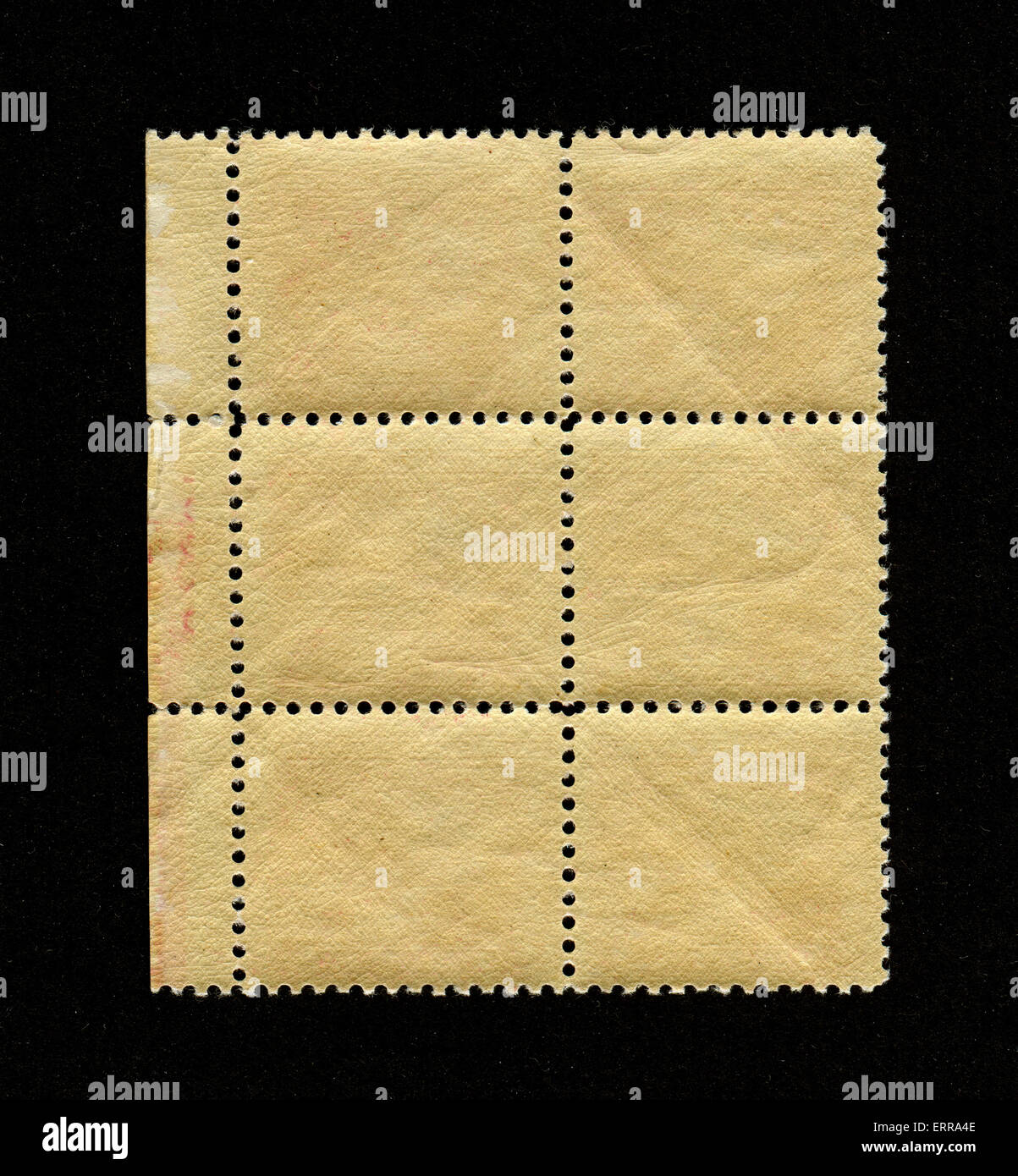 The reverse side of a postage stamp Stock Photo - Alamy