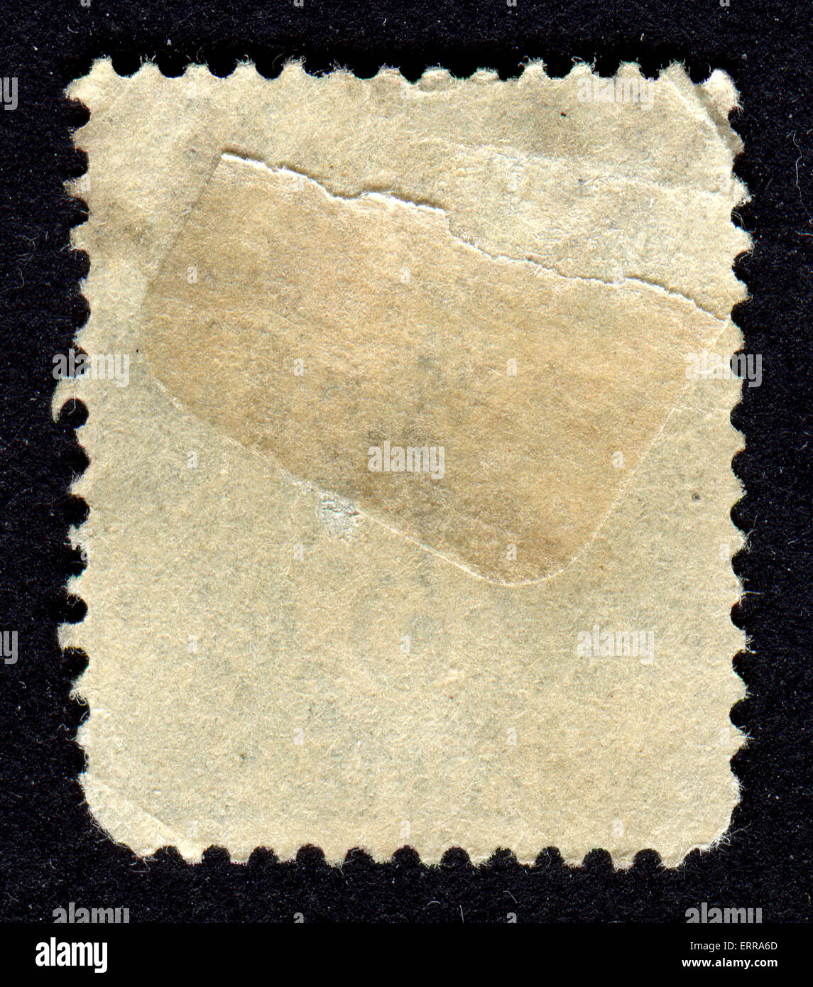 The reverse side of a postage stamp Stock Photo - Alamy