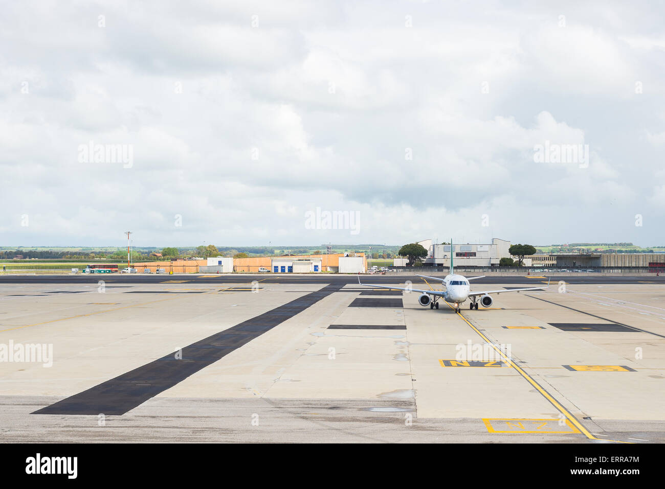 Airplane on an airport landing strip hi-res stock photography and ...