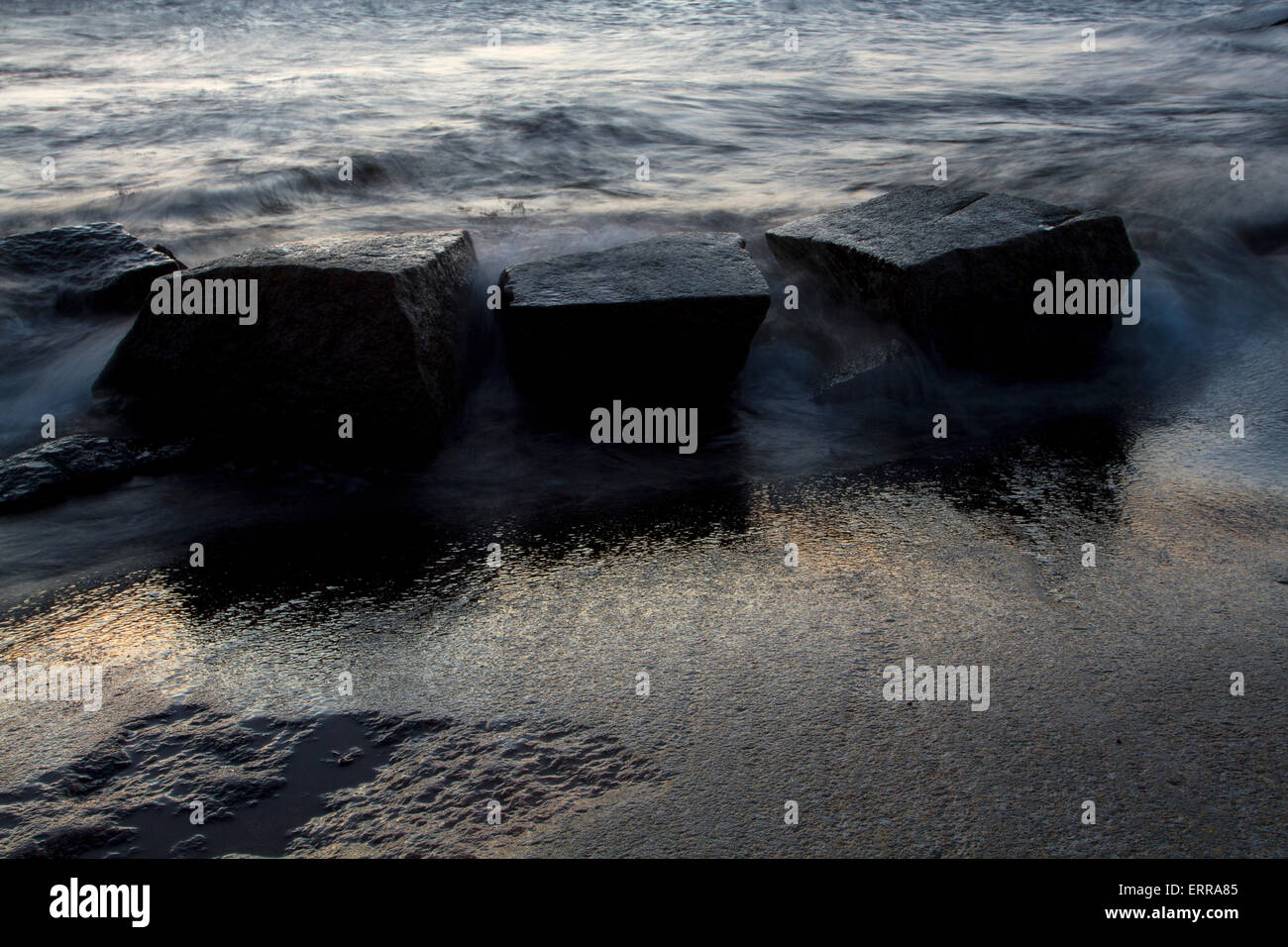 Stones on rock Stock Photo - Alamy