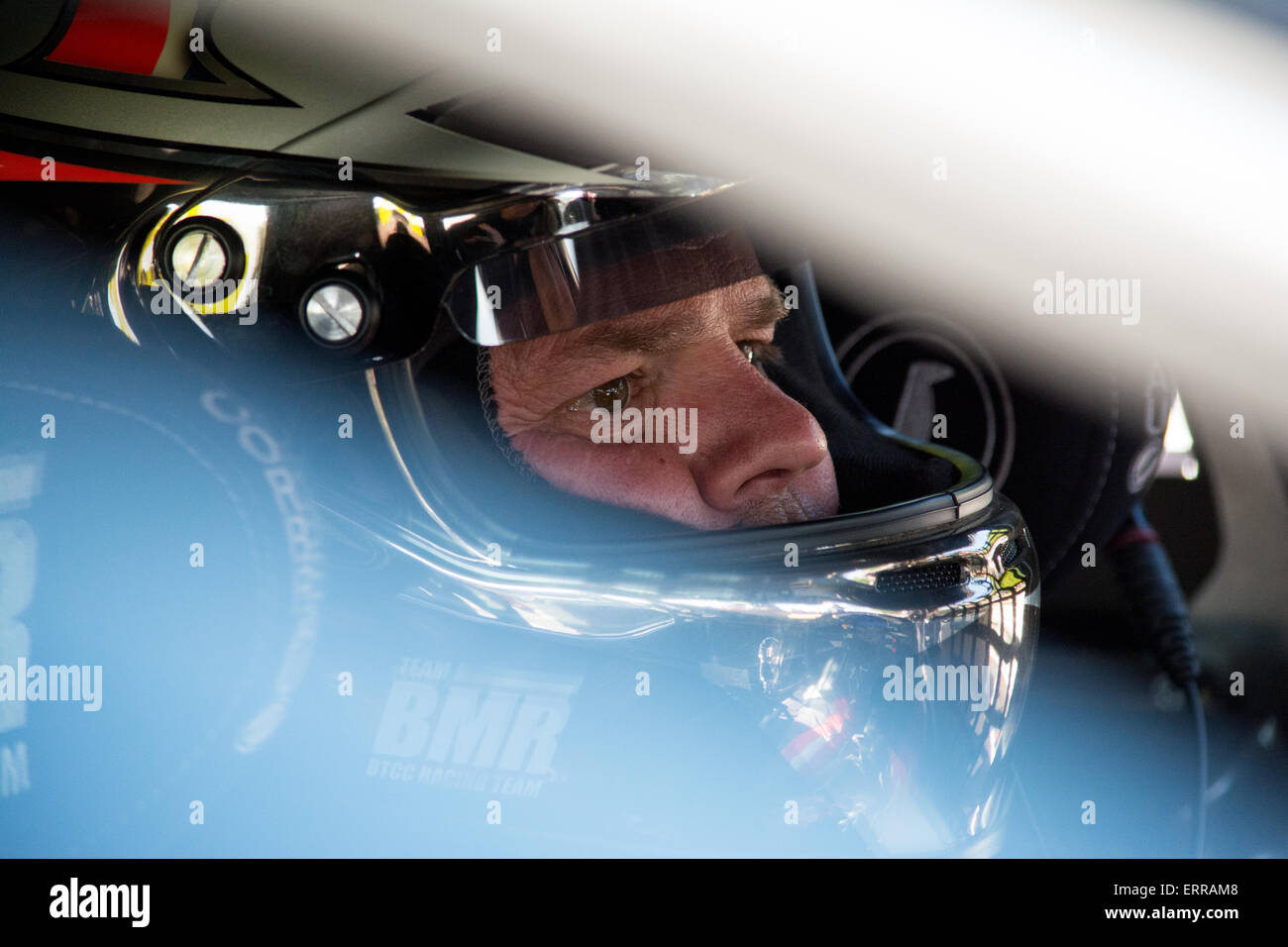 Oulton Park, UK. 7th June, 2015. Warren Scott of Team BMR prepares for ...