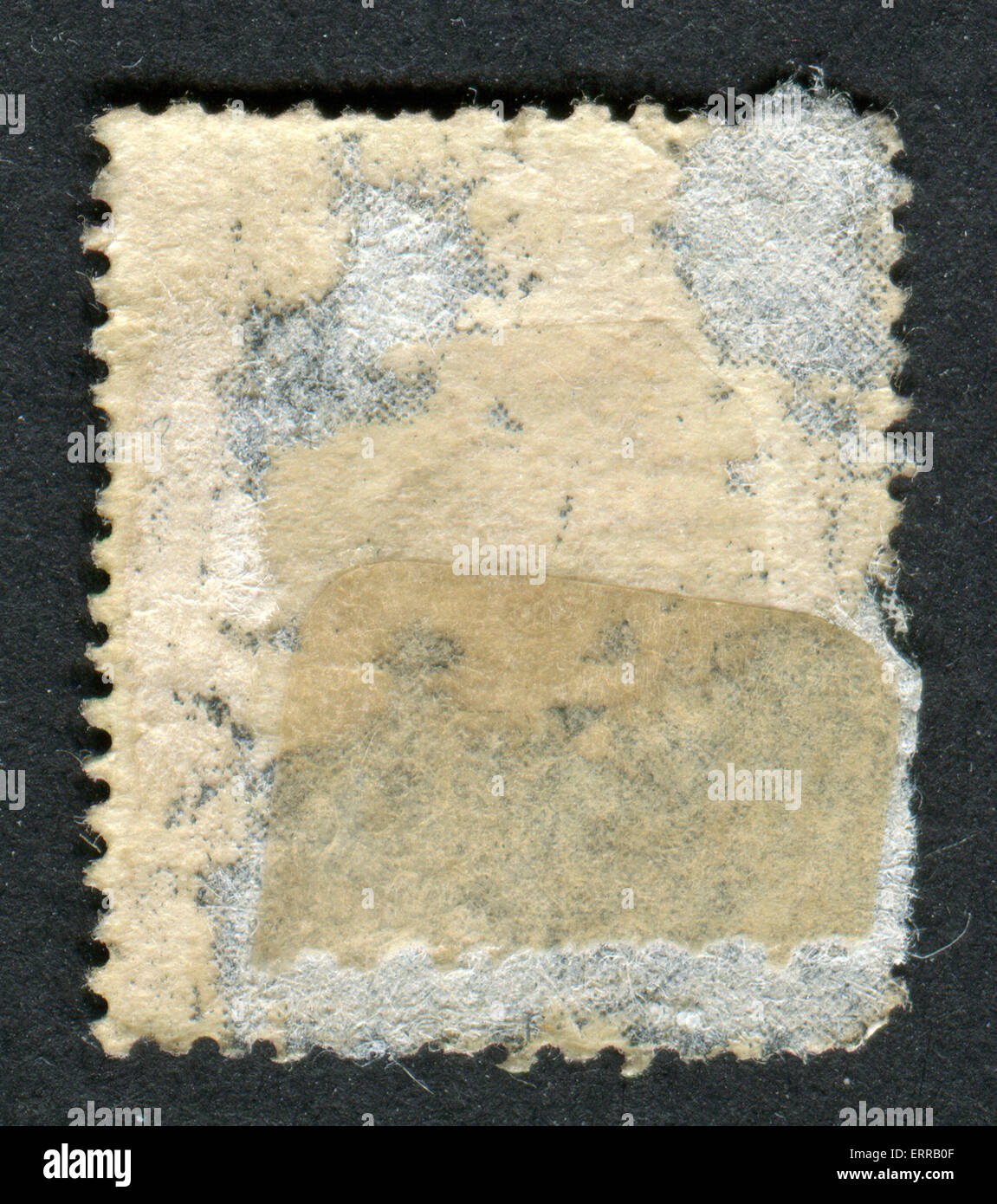 The reverse side of a postage stamp Stock Photo - Alamy