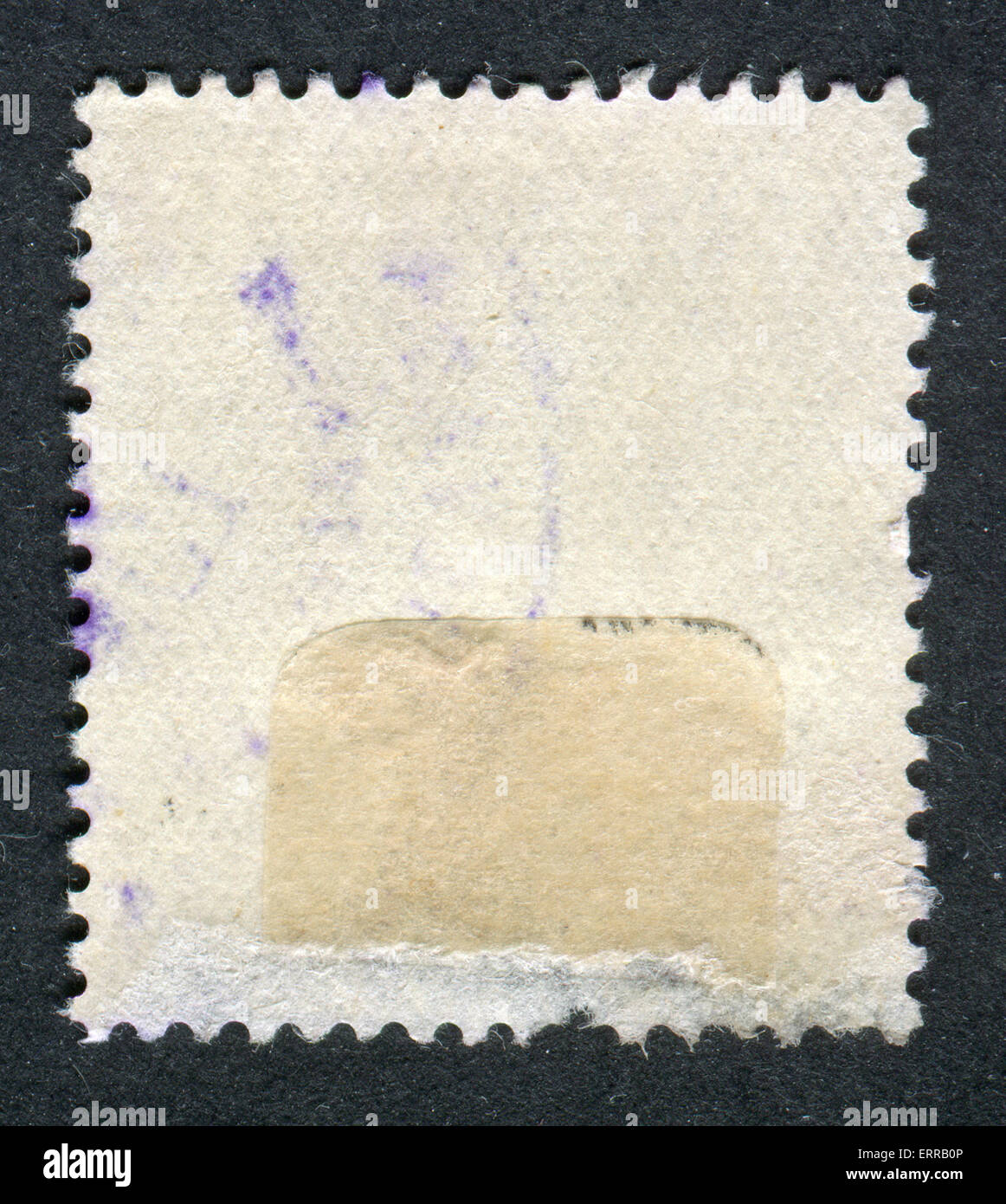 The reverse side of a postage stamp Stock Photo - Alamy