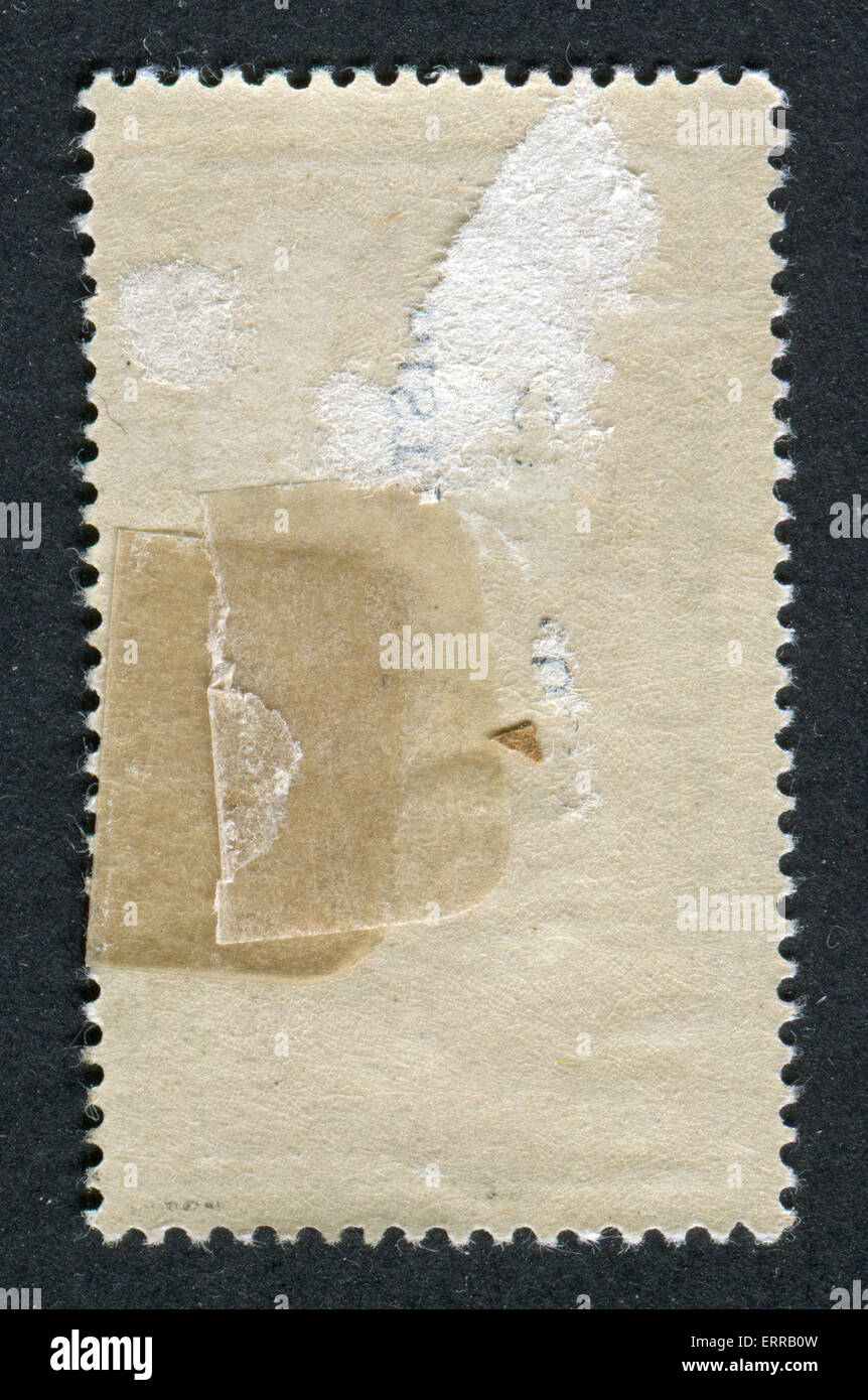 The reverse side of a postage stamp Stock Photo - Alamy