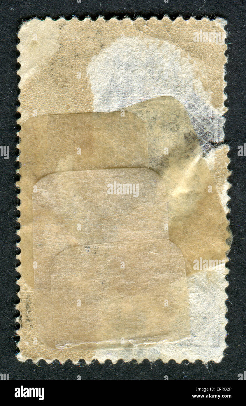 The reverse side of a postage stamp Stock Photo - Alamy