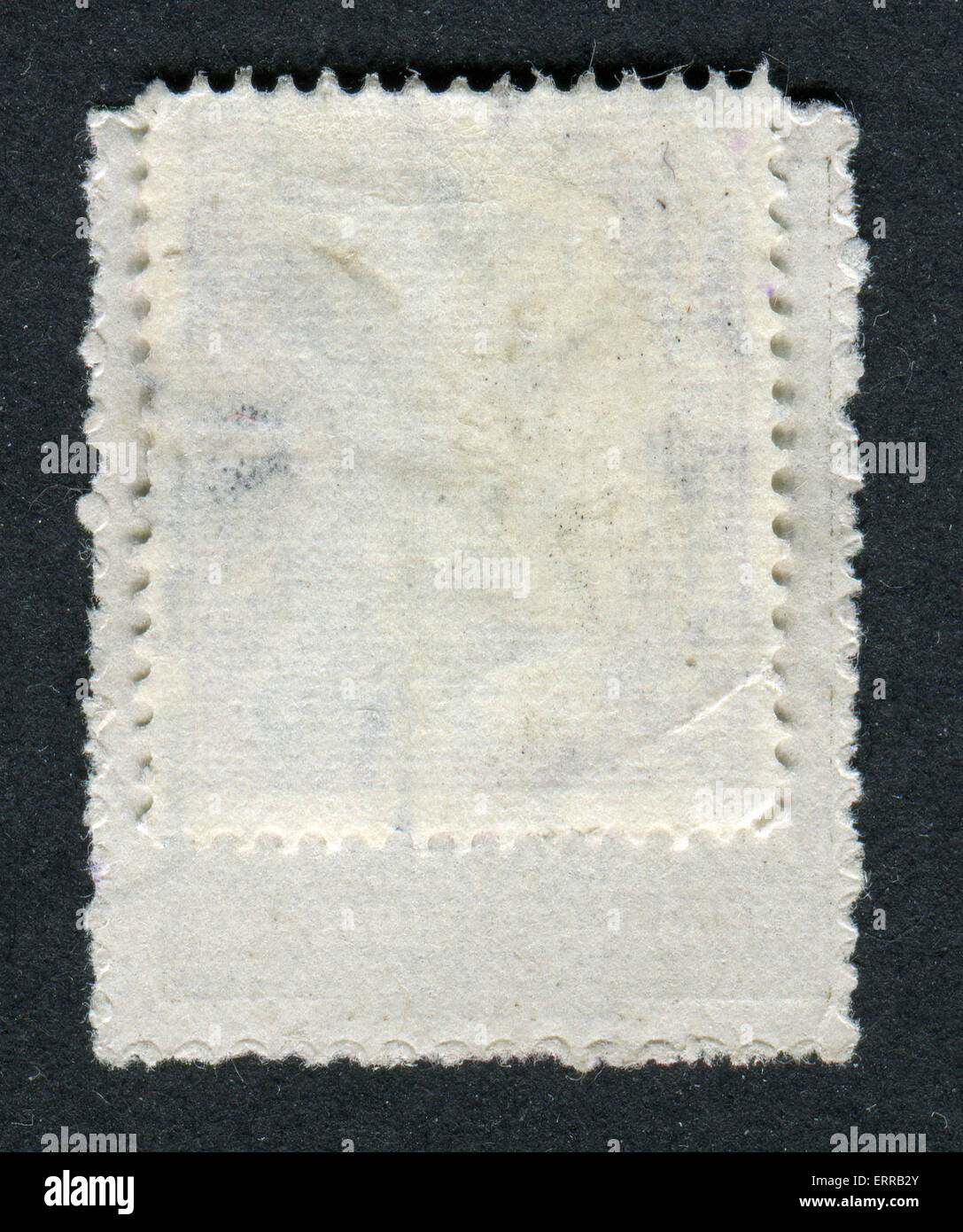 The reverse side of a postage stamp Stock Photo - Alamy