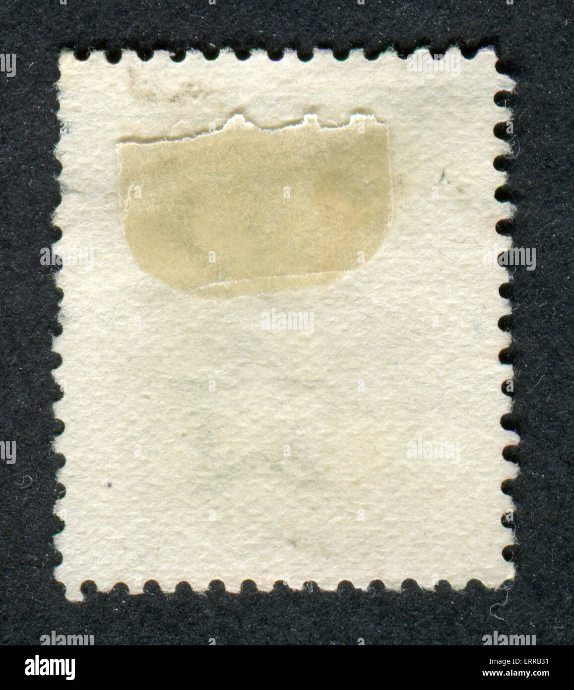The reverse side of a postage stamp Stock Photo - Alamy