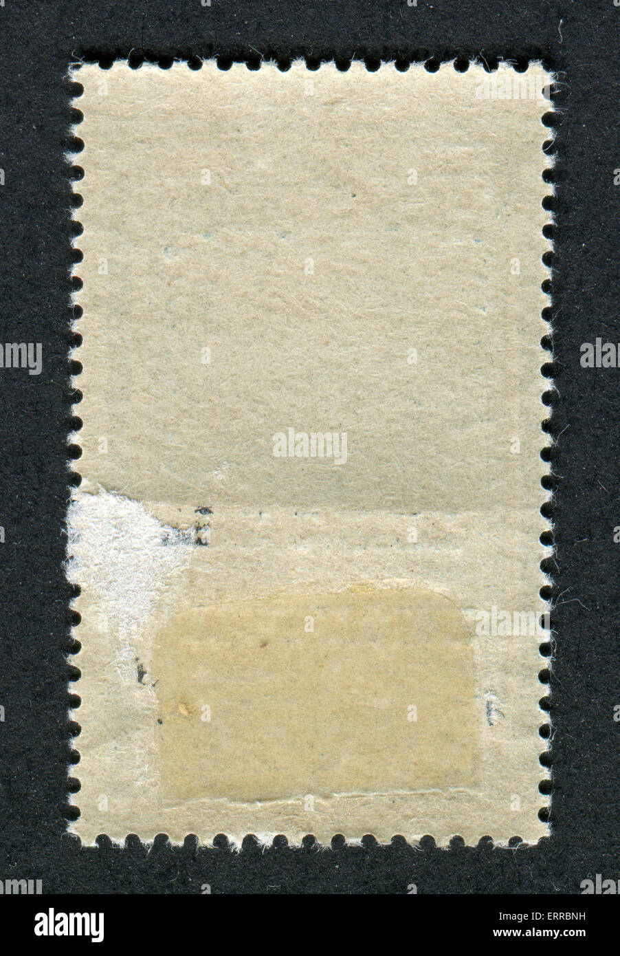 The reverse side of a postage stamp Stock Photo - Alamy