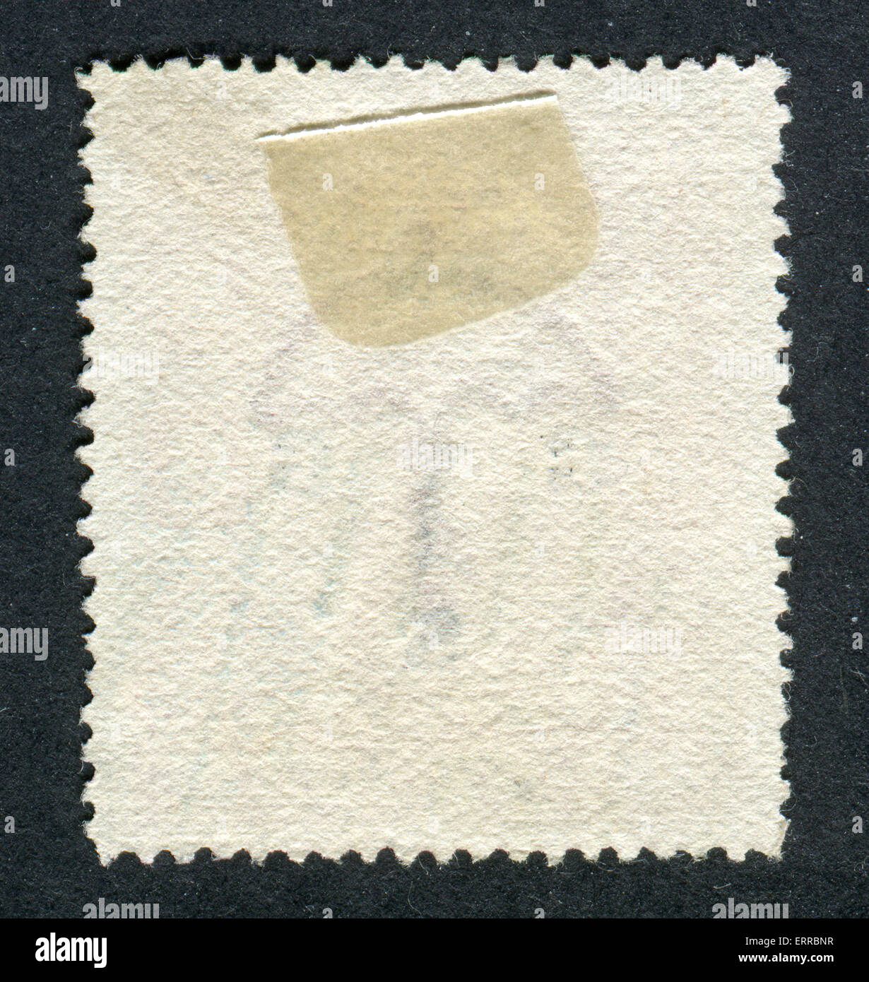 The reverse side of a postage stamp Stock Photo - Alamy