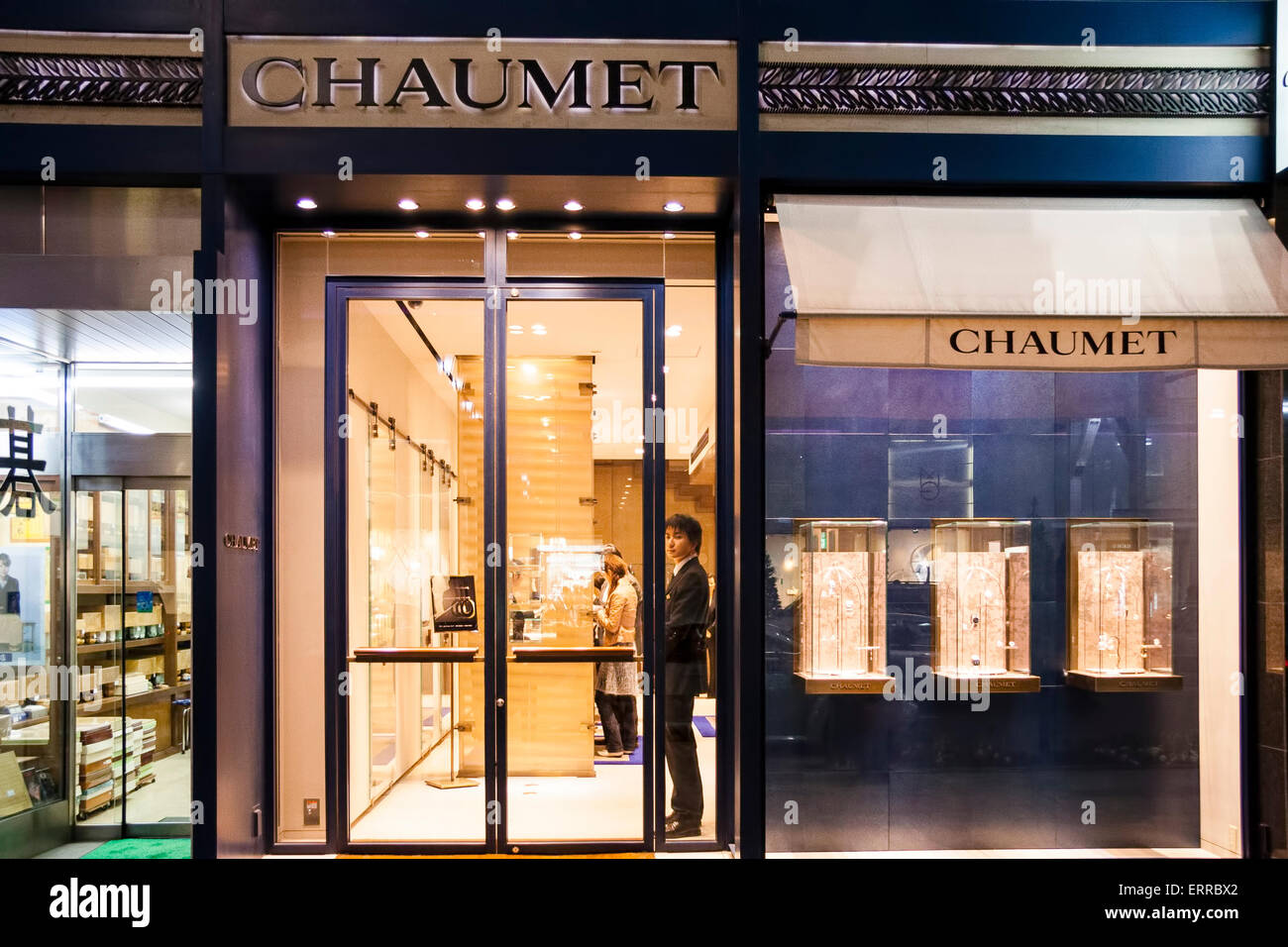 The Tokyo Ginza at night. Exterior view of the entrance with doorman ...