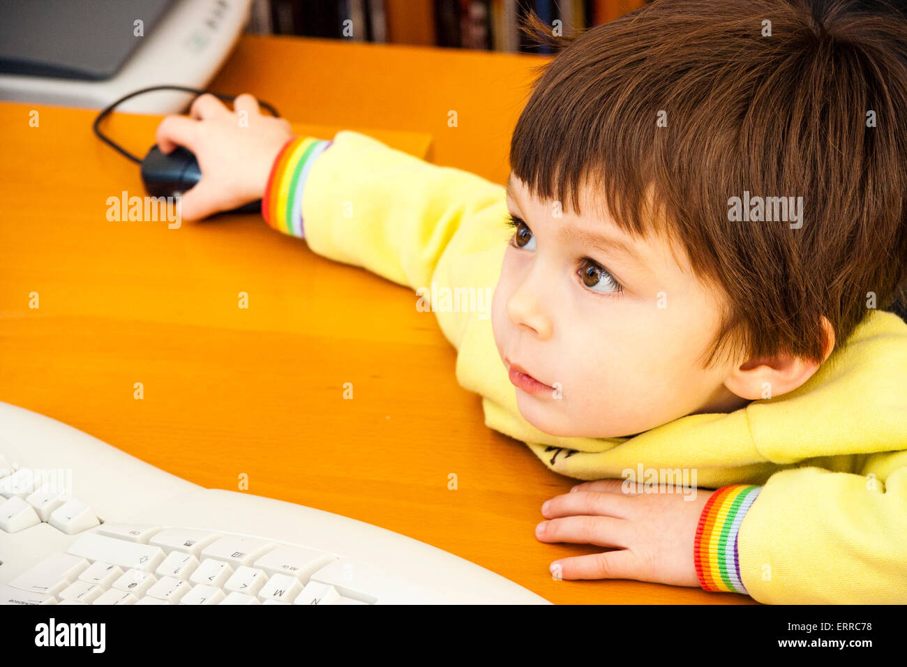 Year old boy uses computer hi-res stock photography and images - Alamy