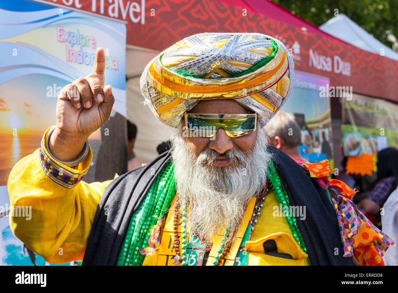 Sikh Punjabi man Kala Kala in colourful Dastar turban and vibrant ...