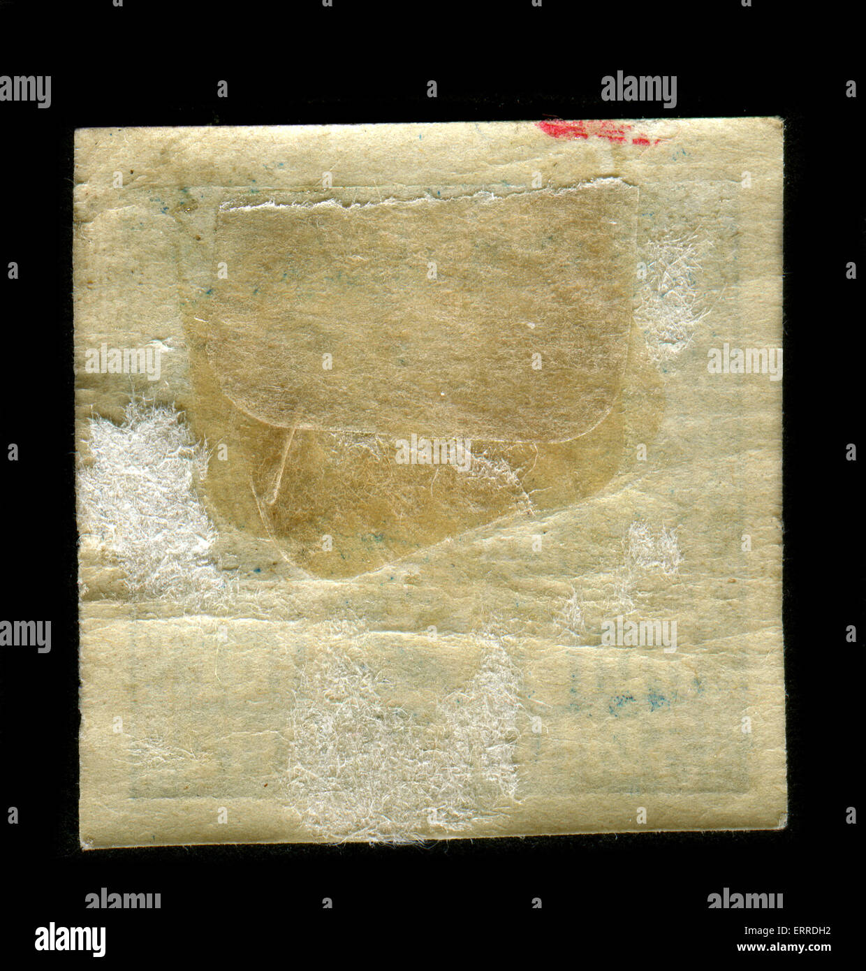 The reverse side of a postage stamp Stock Photo - Alamy