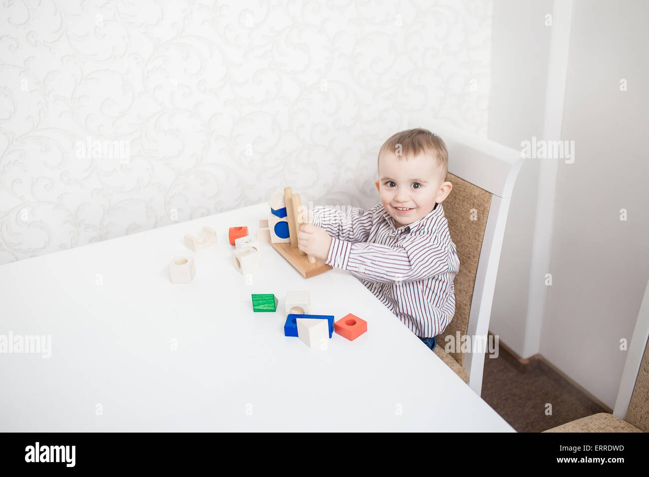 Cute baby boy with blocks Stock Photo - Alamy