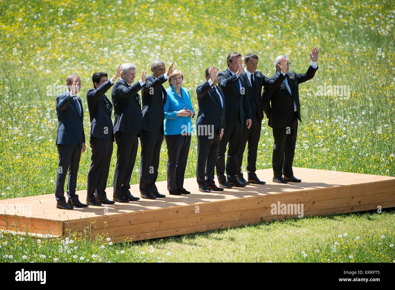 World leaders stand for a group photo during the G7 Summit meeting June ...