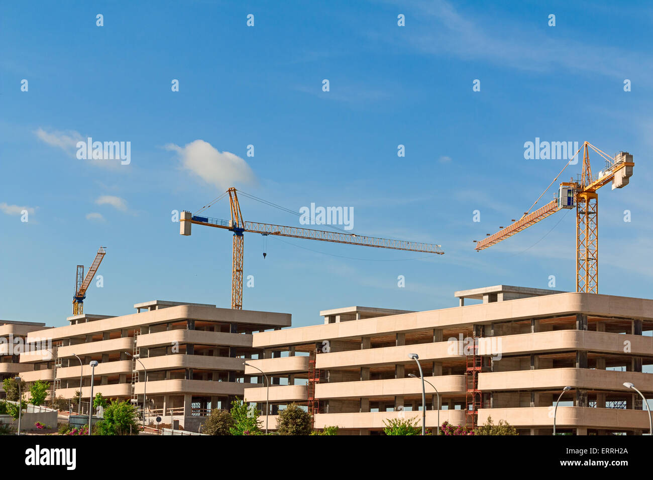 Skeleton of buildings under construction with the crane Stock Photo - Alamy