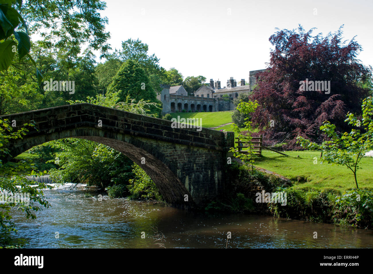 Stone bridge over the River Manifold at Ilam Hall, Ilam, Staffordshire ...