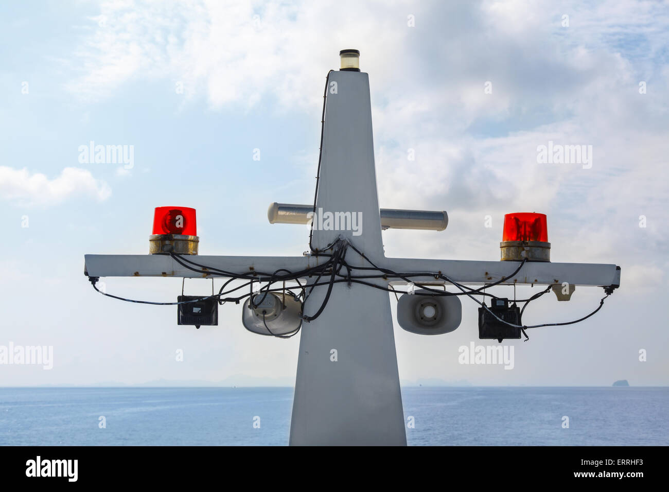 Two red beacon lights on white mast ship Stock Photo - Alamy