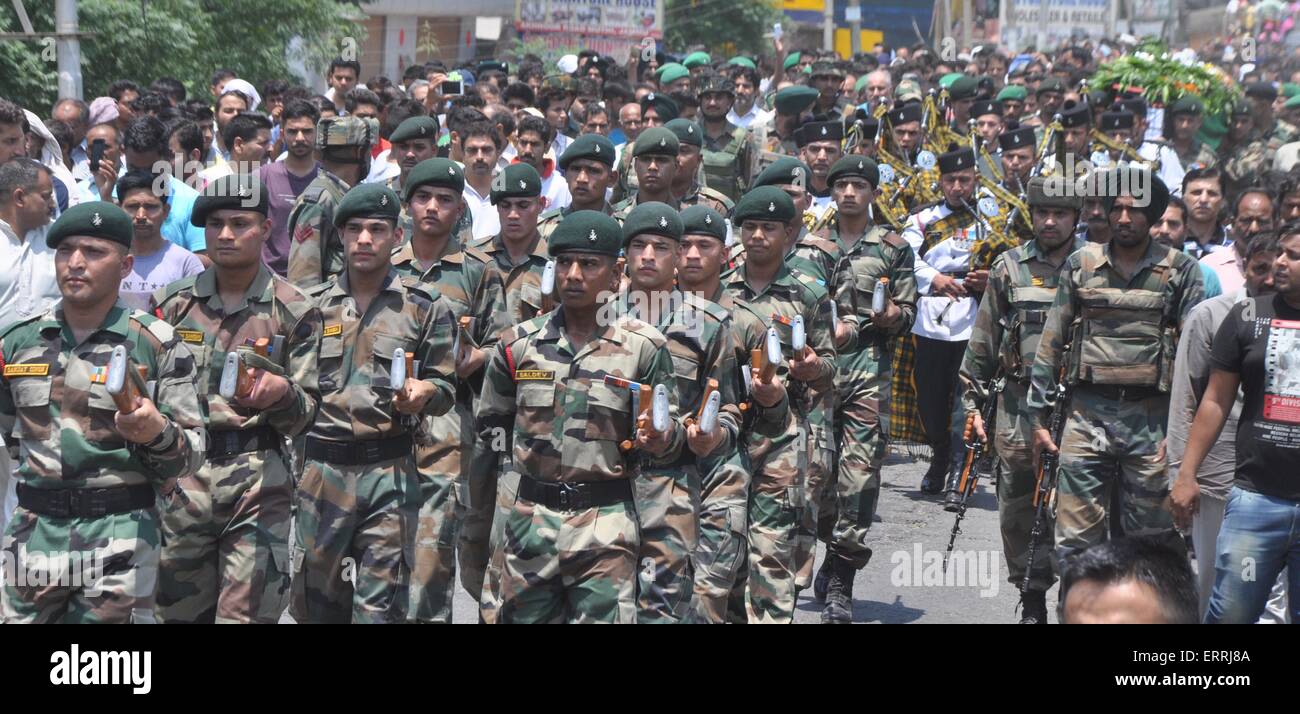 India. 07th June, 2015. Indian soldiers carry the coffin of Havildar ...