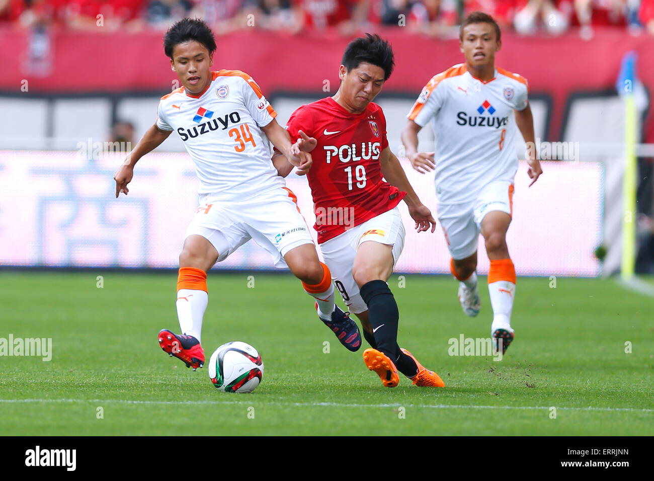 Saitama, Japan. 7th June, 2015. (L-R) Takuma Mizutani (S-Pulse), Yuki ...