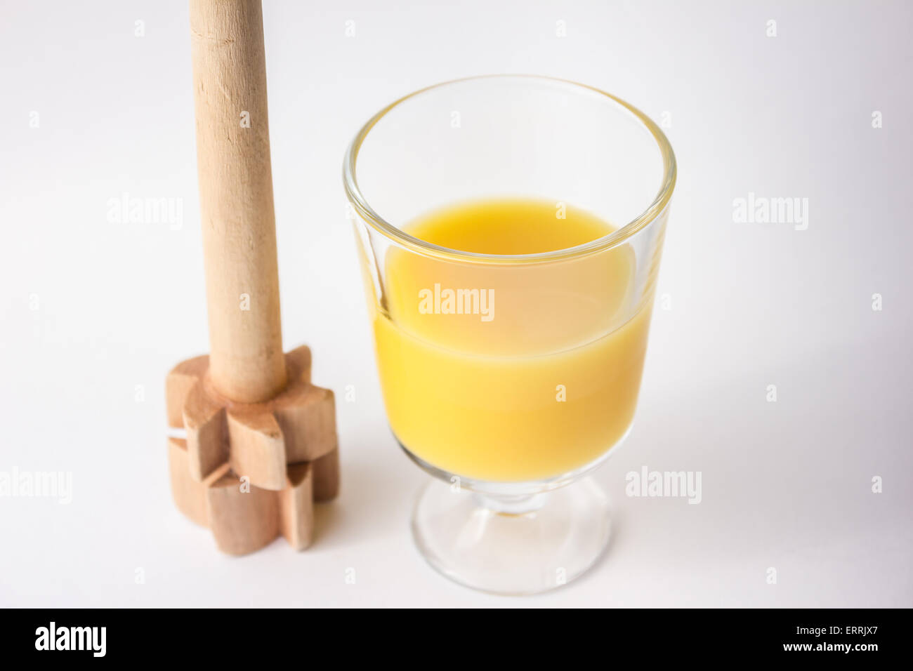 Glass of poncha in white background Stock Photo - Alamy